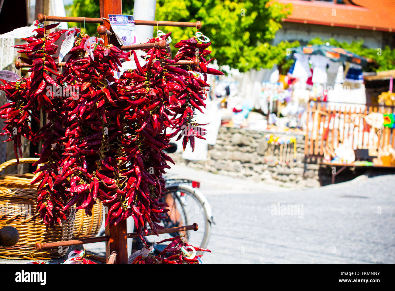Red hungarian pepper garland at outdoor Stock Photo - Alamy