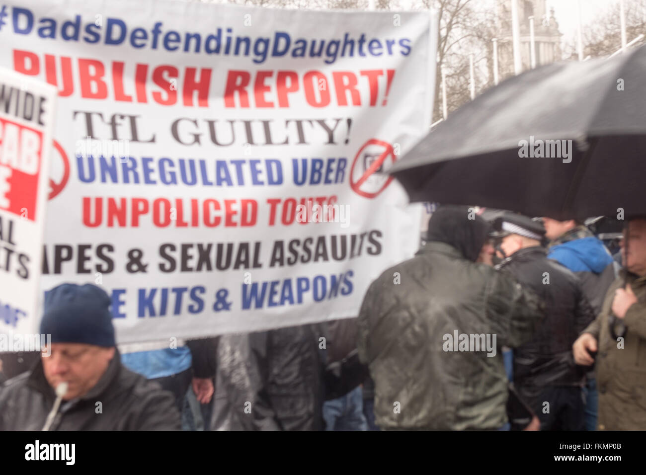 London, UK. 9th March, 2016. Black cab drivers anti uber protest banner ...