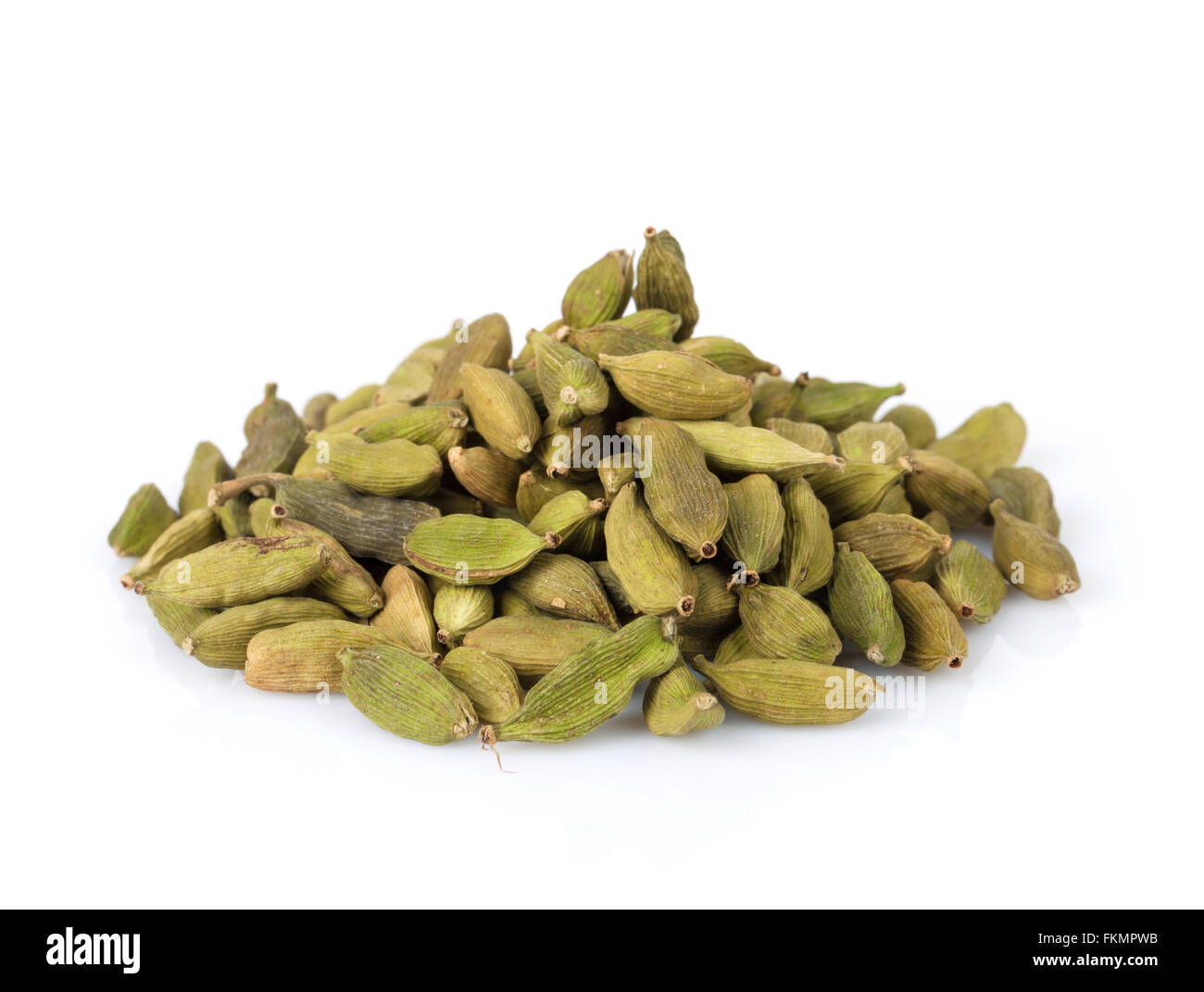 Green cardamom spice. Isolated on white background Stock Photo - Alamy