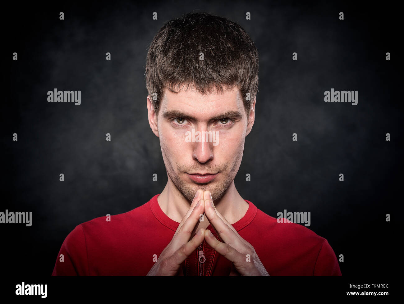 Young man thinking Stock Photo - Alamy