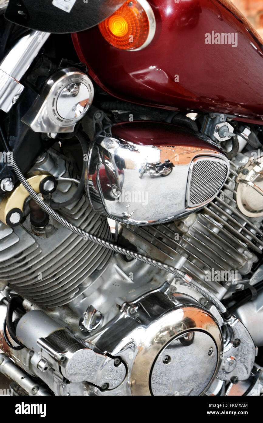 The engine of a motorcycle with a red petrol tank Stock Photo - Alamy