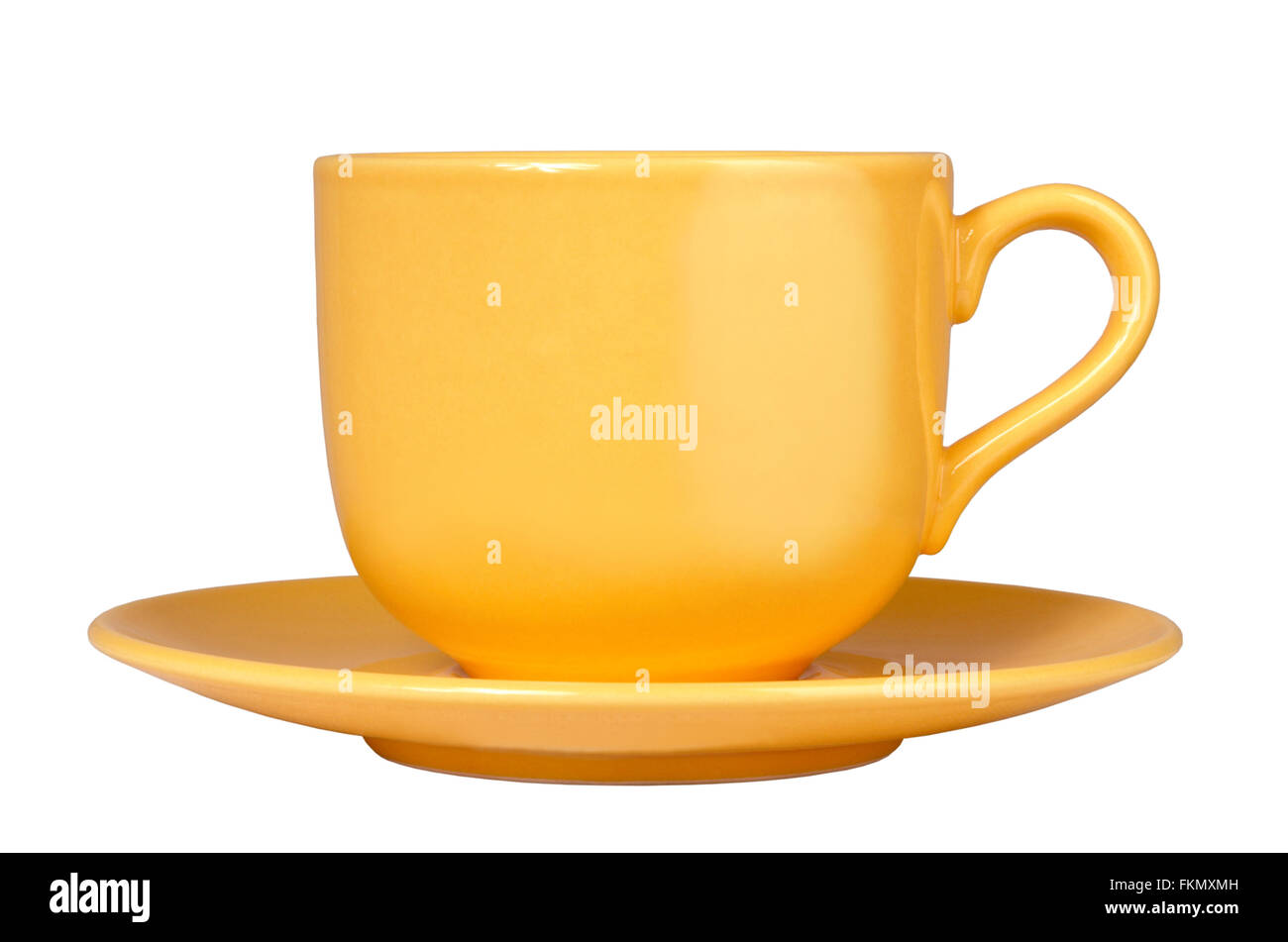 Yellow tea cup on a white background Stock Photo - Alamy