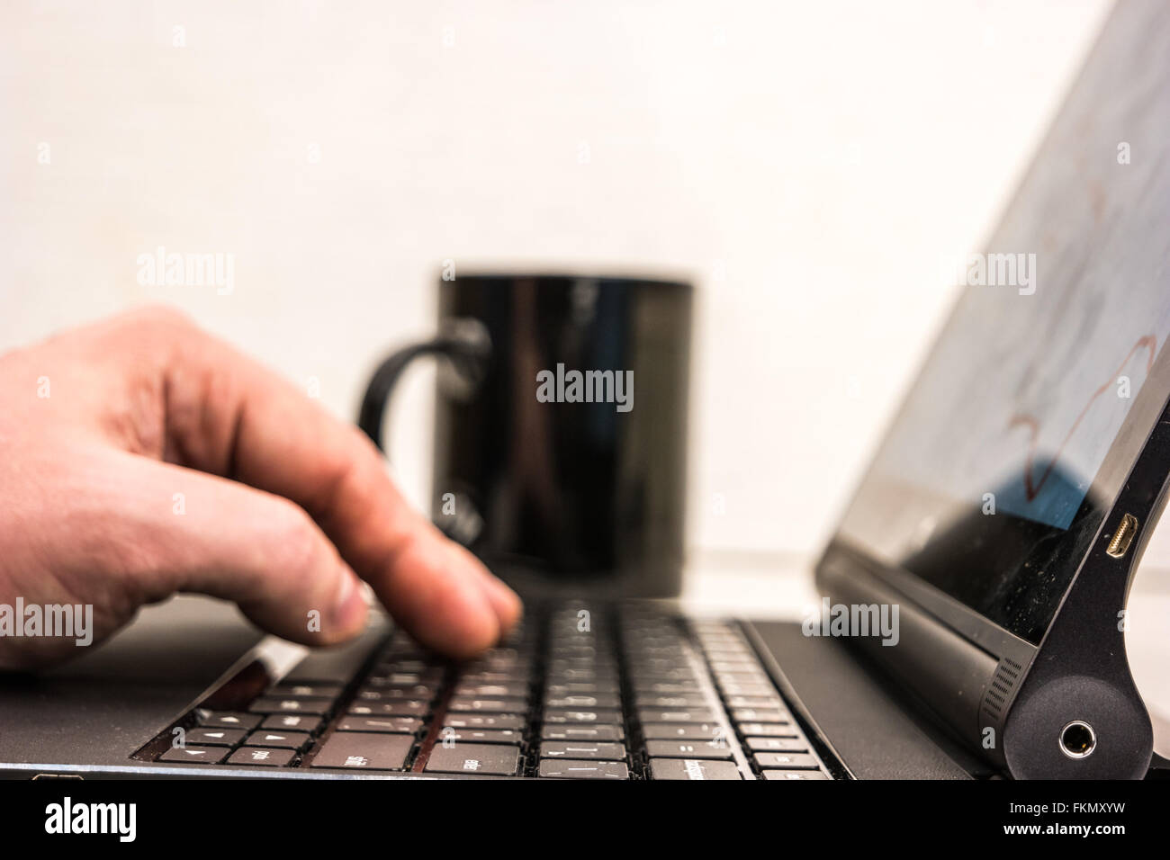 laptop with hands on wood Stock Photo - Alamy