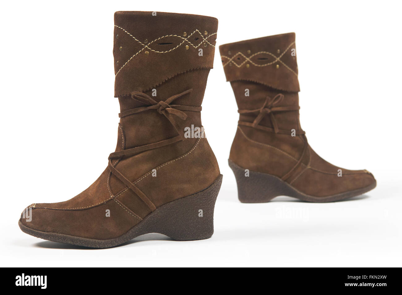 Female leather boots isolated on white. Horizontal Stock Photo - Alamy