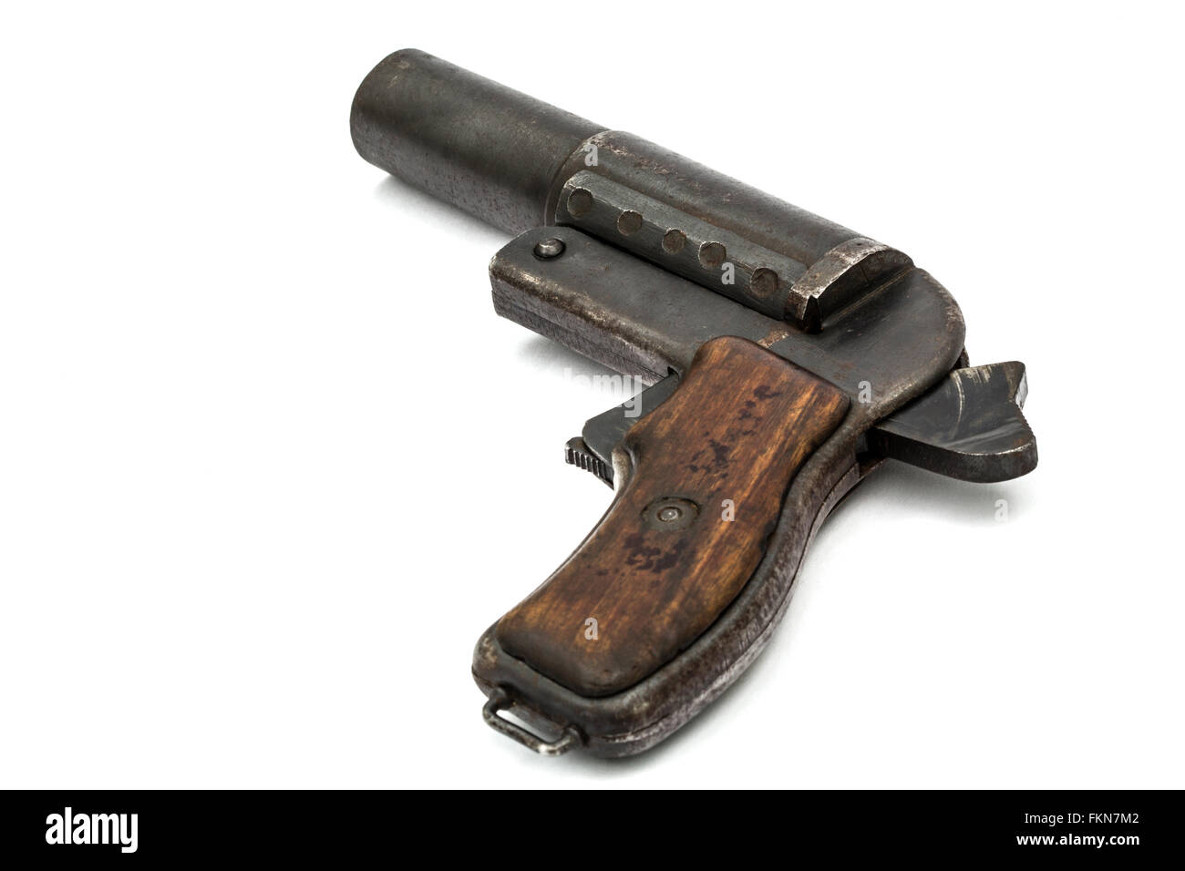Old signal pistol, flare gun with the hammer cocked, isolated on white ...