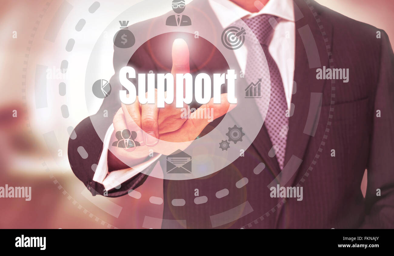 Businessman pressing an Support concept button Stock Photo - Alamy