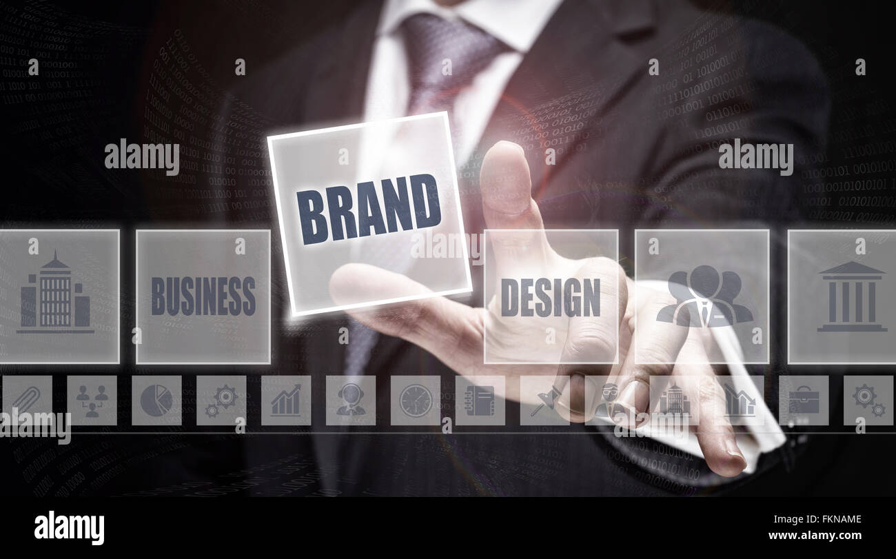 Businessman pressing a Brand concept button Stock Photo - Alamy