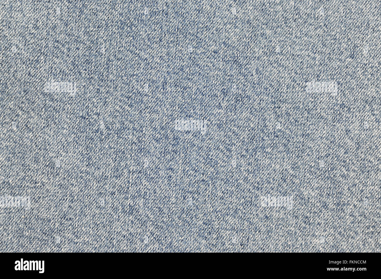 Light blue jeans fabric shot as background Stock Photo - Alamy