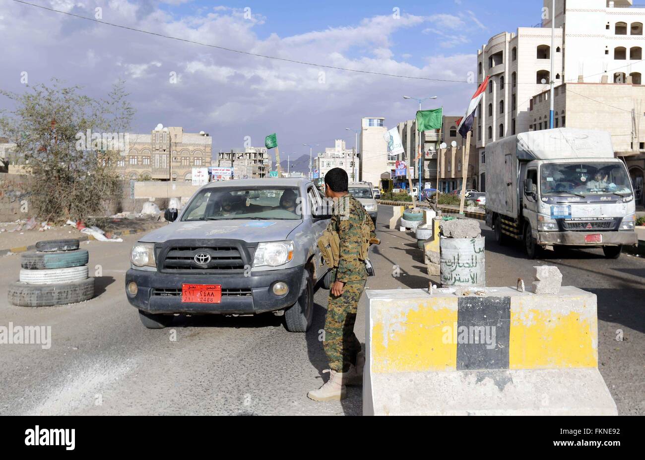 Sanaa. 9th Mar, 2016. A Houthi militia stands guard at a checkpoint in ...