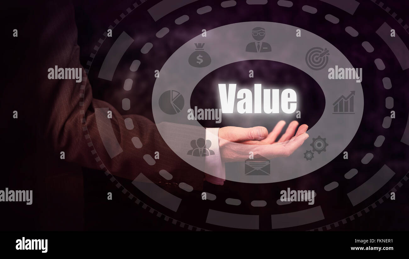 Businessman pressing a Value concept button Stock Photo - Alamy