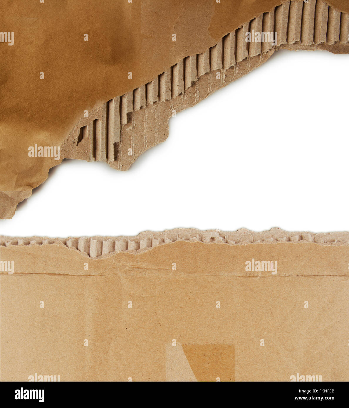 Hole ripped in corrugated cardboard Stock Photo - Alamy