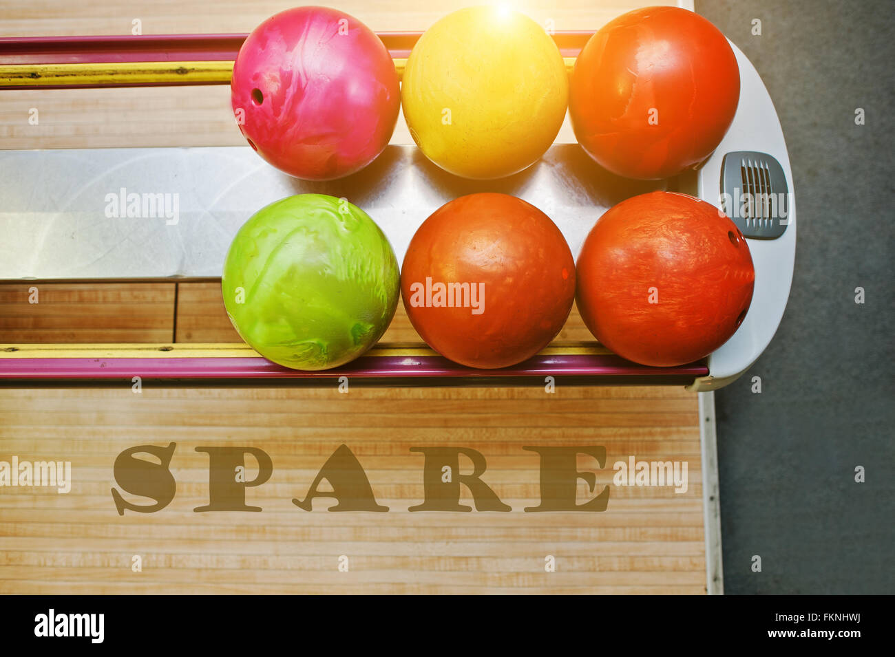 The word spare background bowling balls Stock Photo - Alamy
