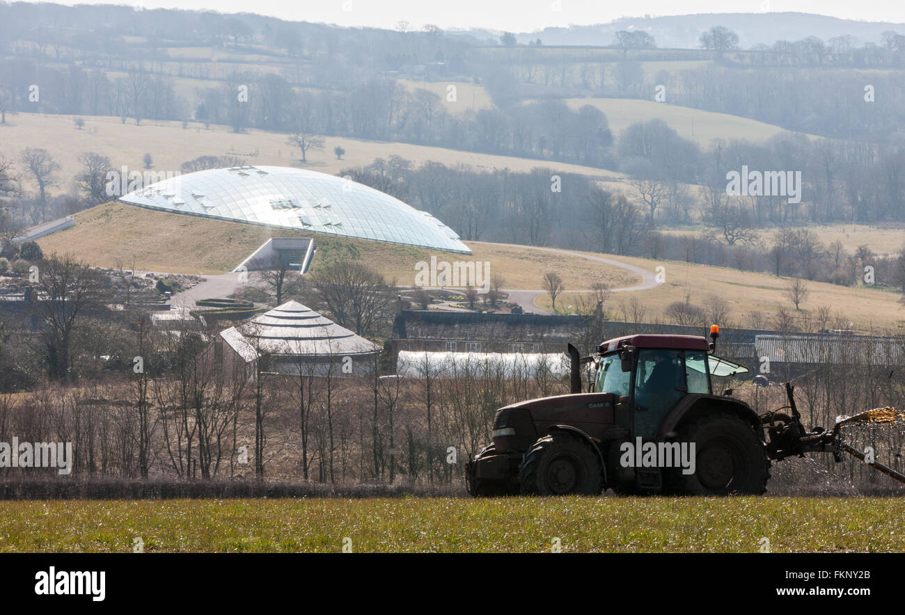 Tractor putting,spraying manure,muck spreading on field and National ...