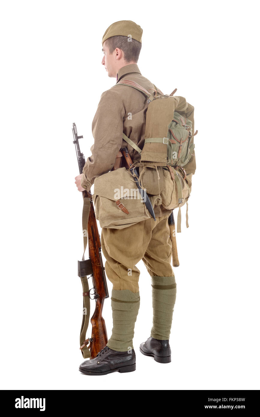 a young Soviet soldier with rifle on the white background Stock Photo ...