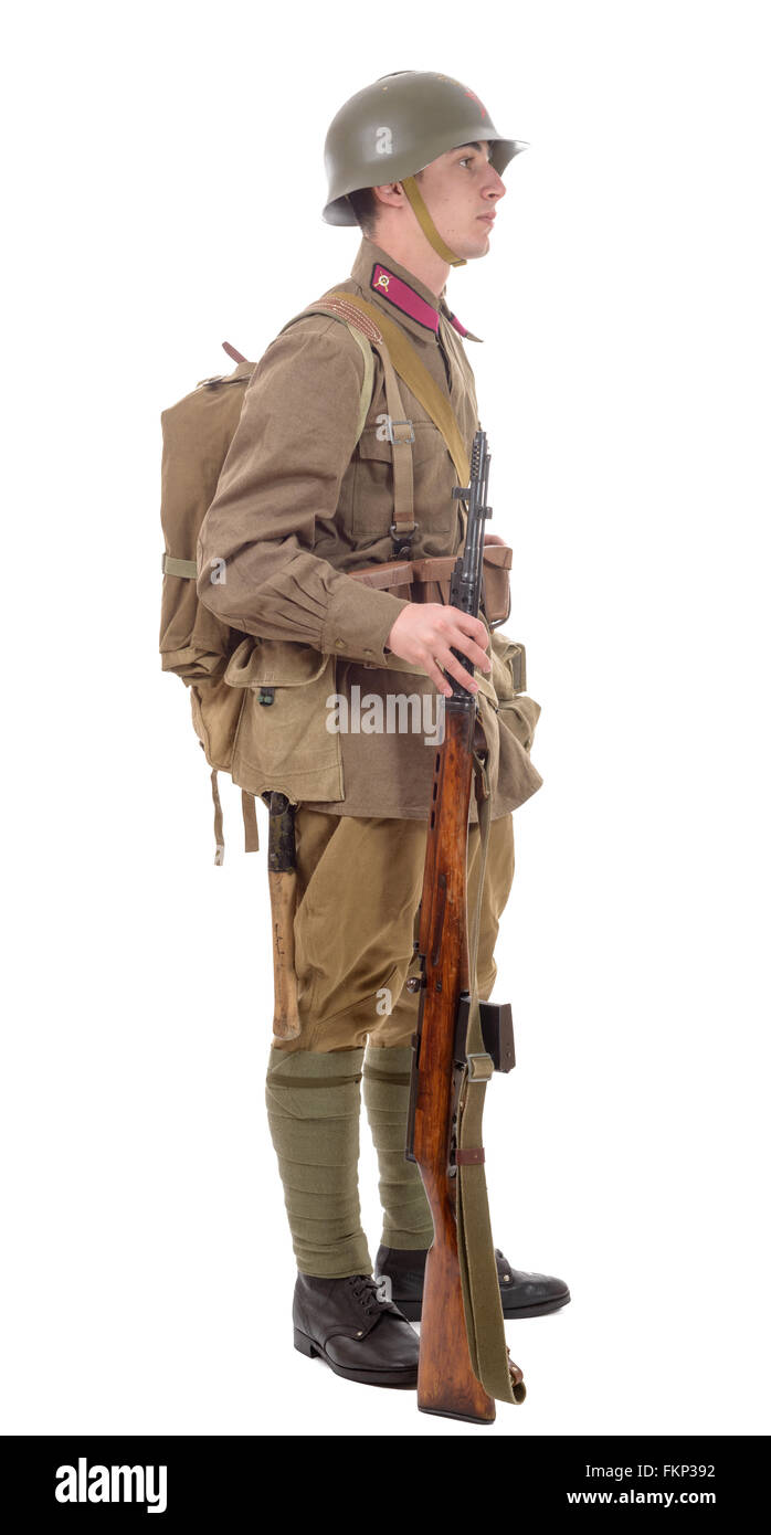 a young Soviet soldier with rifle on the white background Stock Photo ...