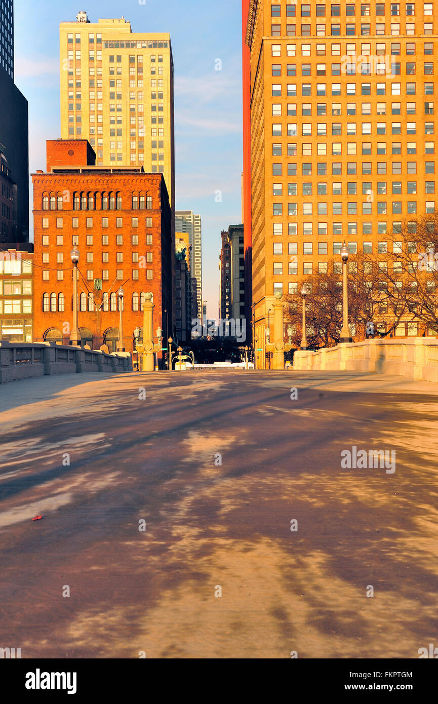 A pedestrian bridge links Grant Park with venerable buildings along ...
