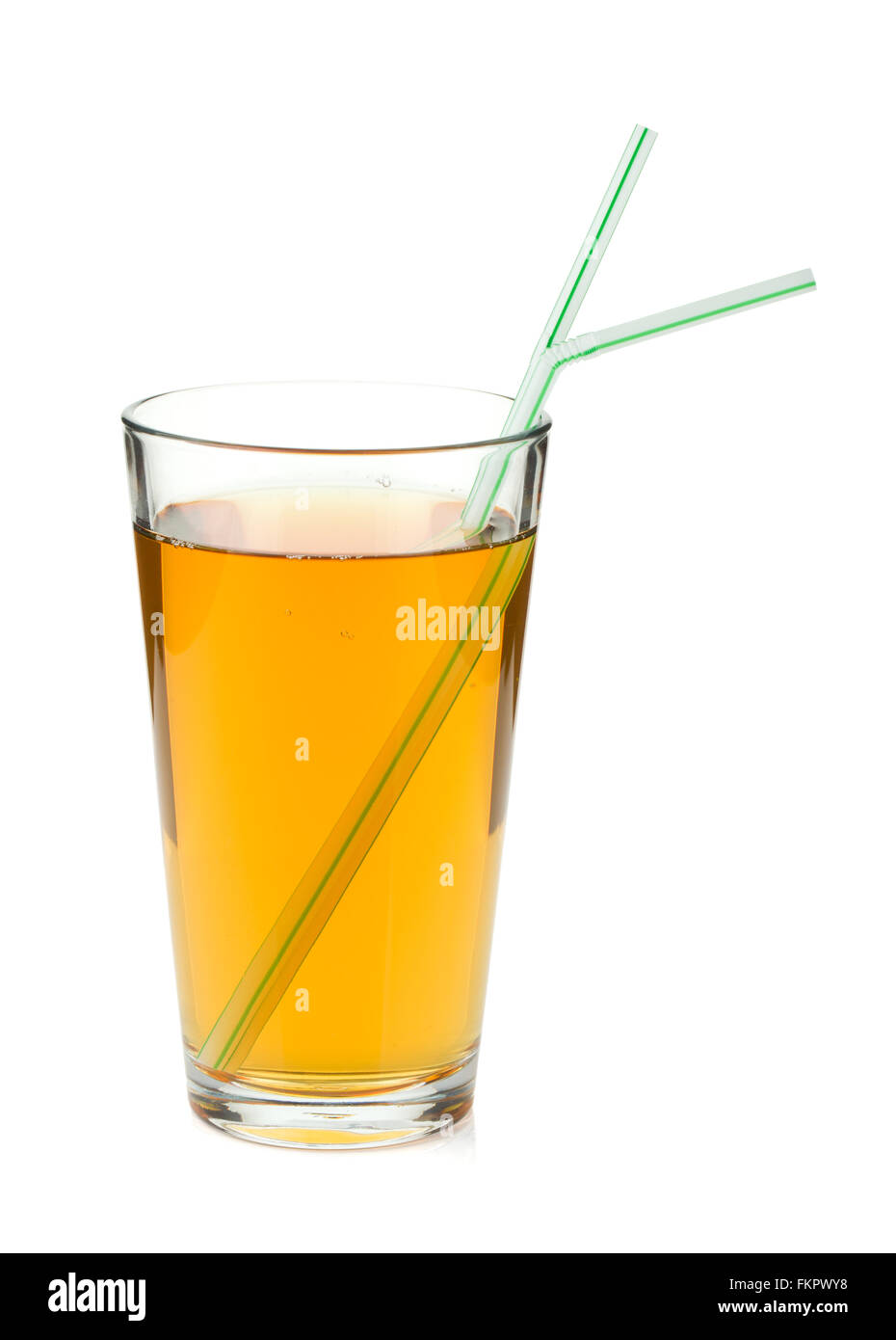 Apple juice in a glass with drinking straws. Isolated on white ...
