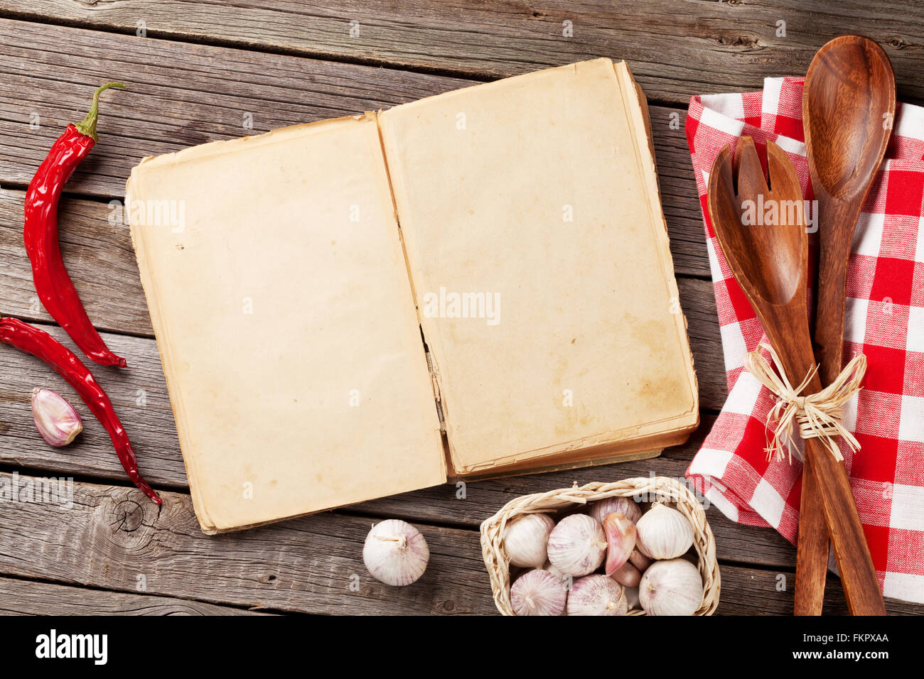 Blank vintage recipe cooking book, utensils and ingredients on wooden ...