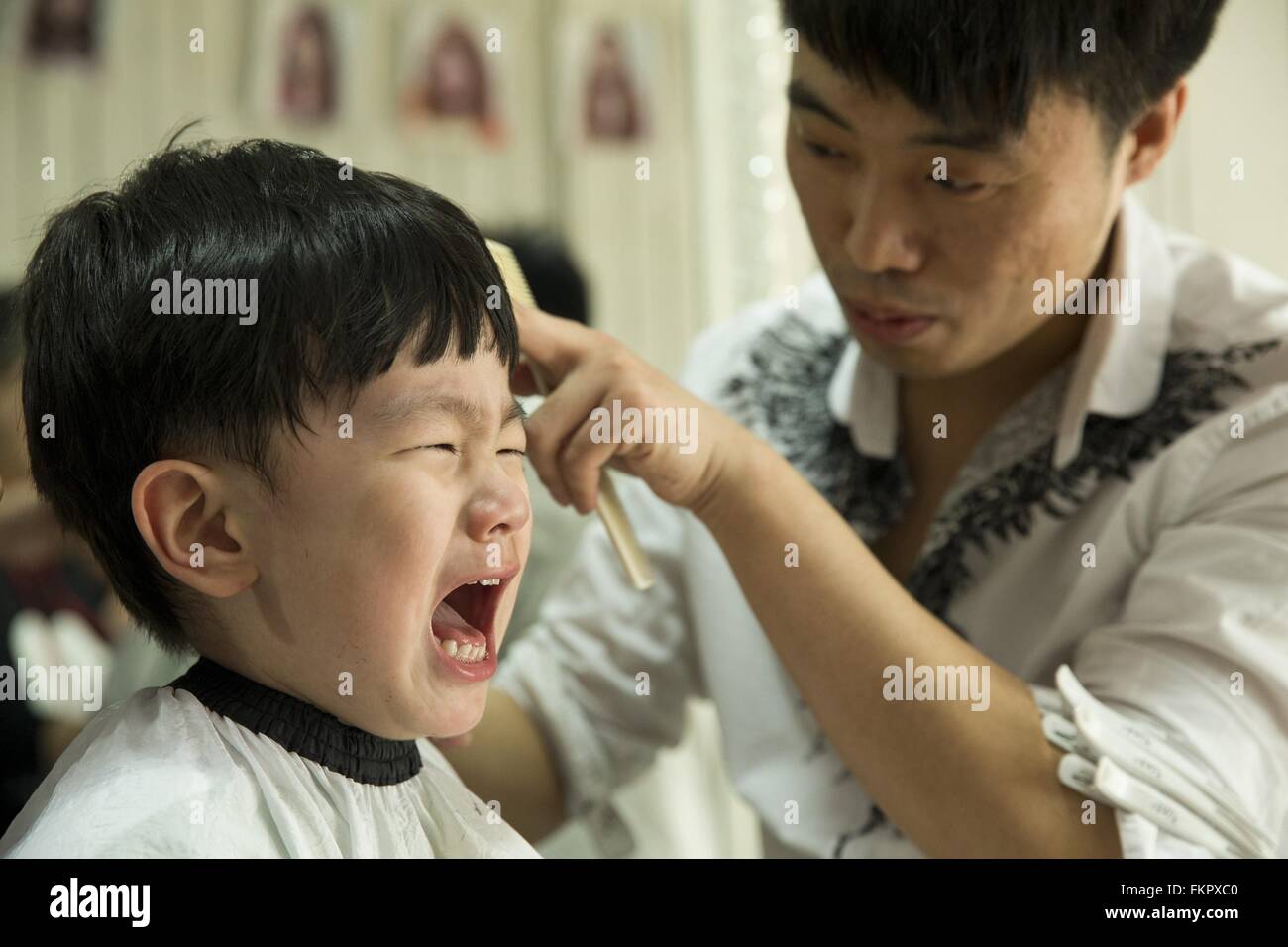 Huludao, China's Liaoning Province. 10th Mar, 2016. A child cries as a ...