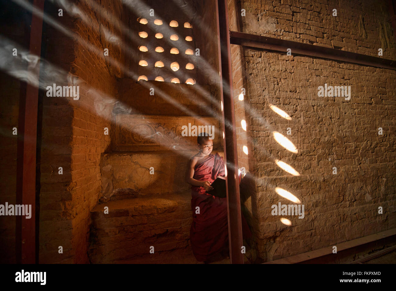 Buddhist monk reading scripture hi-res stock photography and images - Alamy