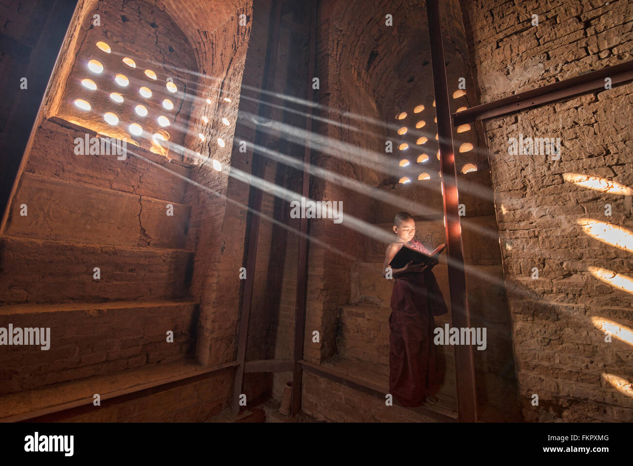 Buddhist monk reading scripture hi-res stock photography and images - Alamy