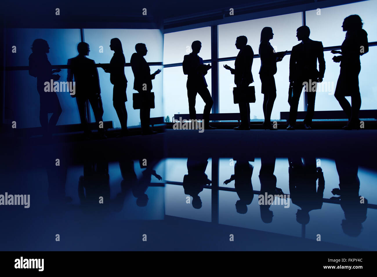 Business people cooperating in office Stock Photo - Alamy