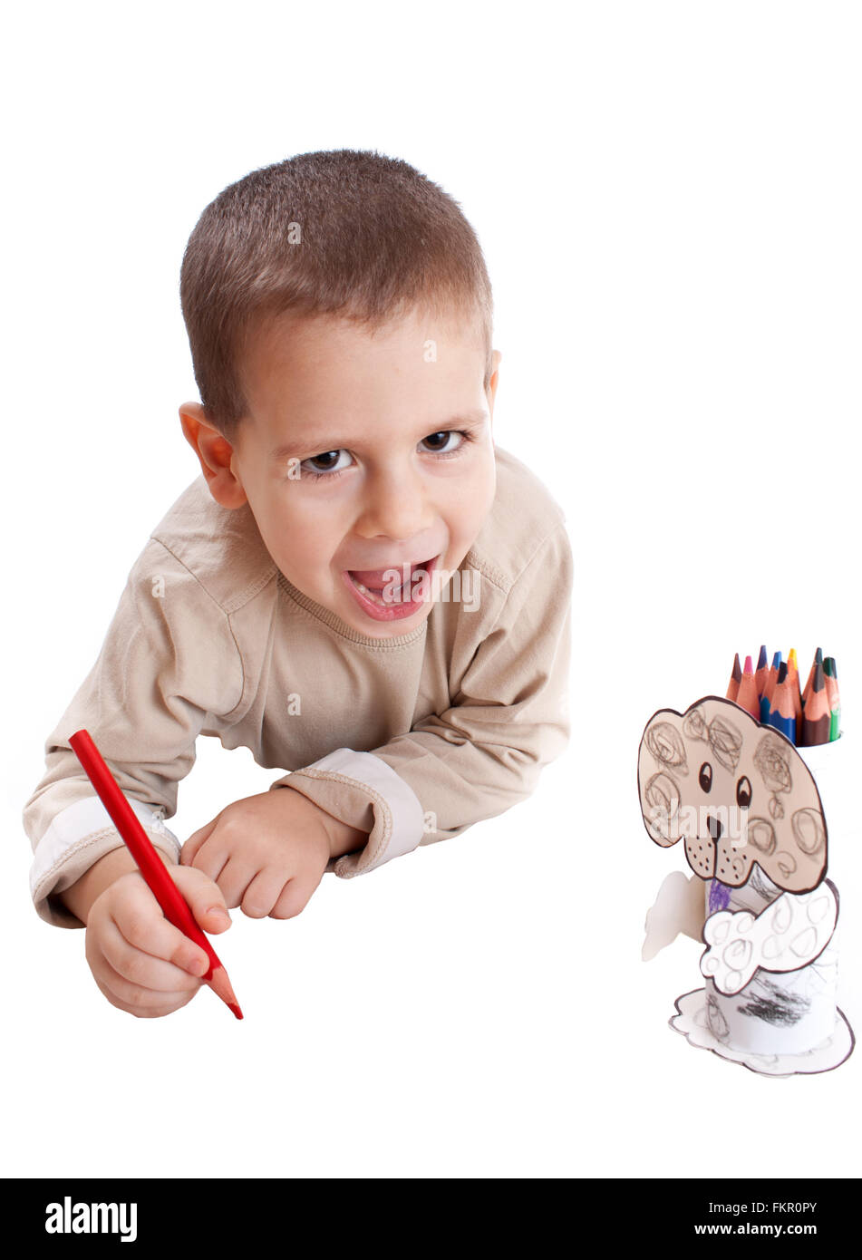 Happy cute boy drawing hi-res stock photography and images - Alamy