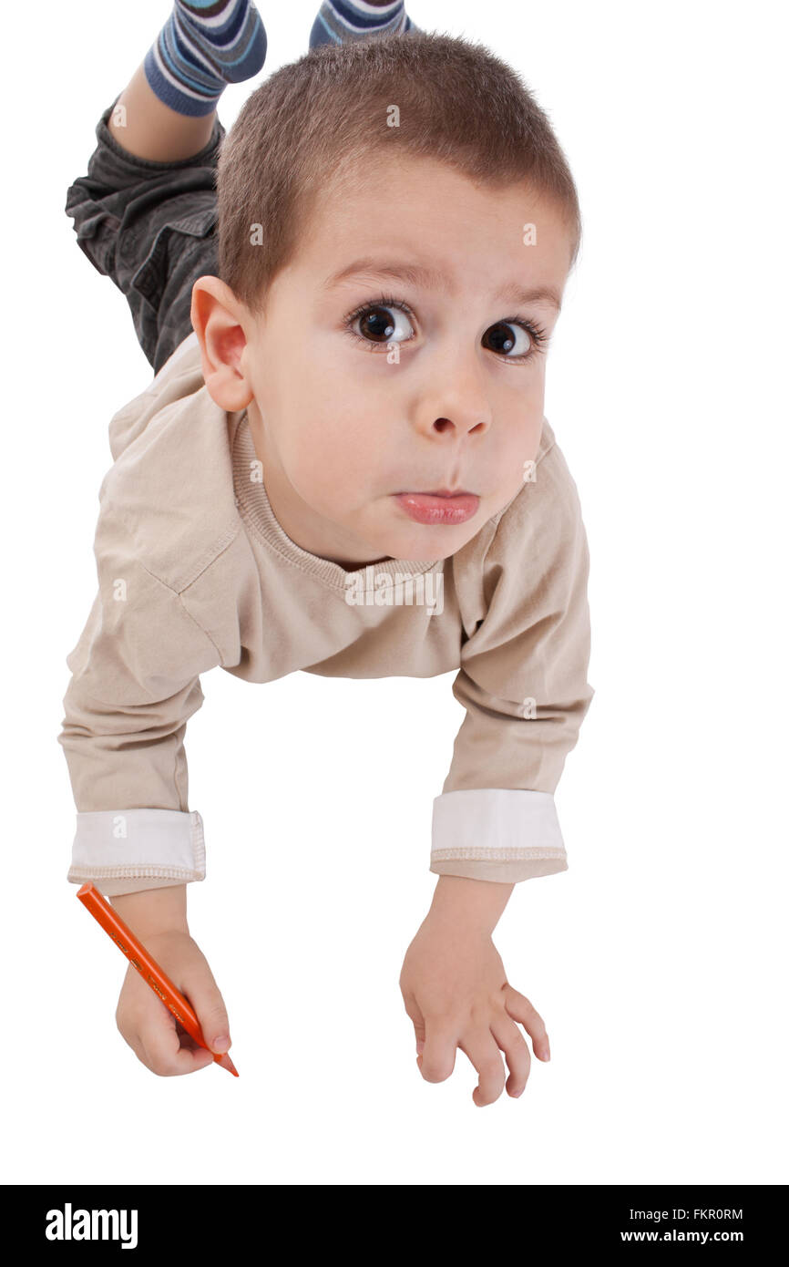 Little boy drawing with red pencil, image taken from above Stock Photo ...