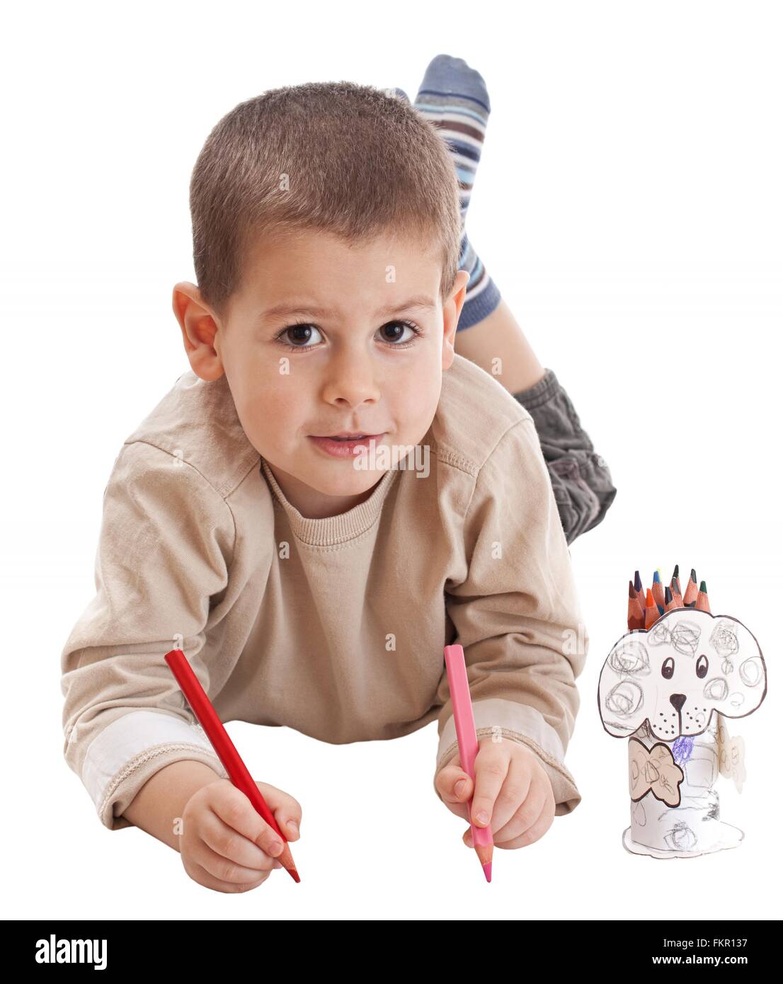 Little boy drawing with two pencils Stock Photo - Alamy
