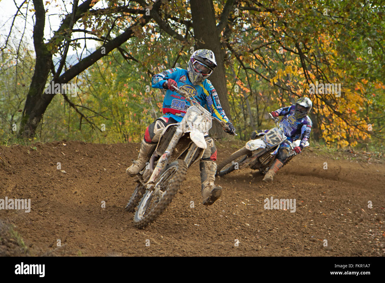 Closeup shot of motocross riders in turn Stock Photo - Alamy