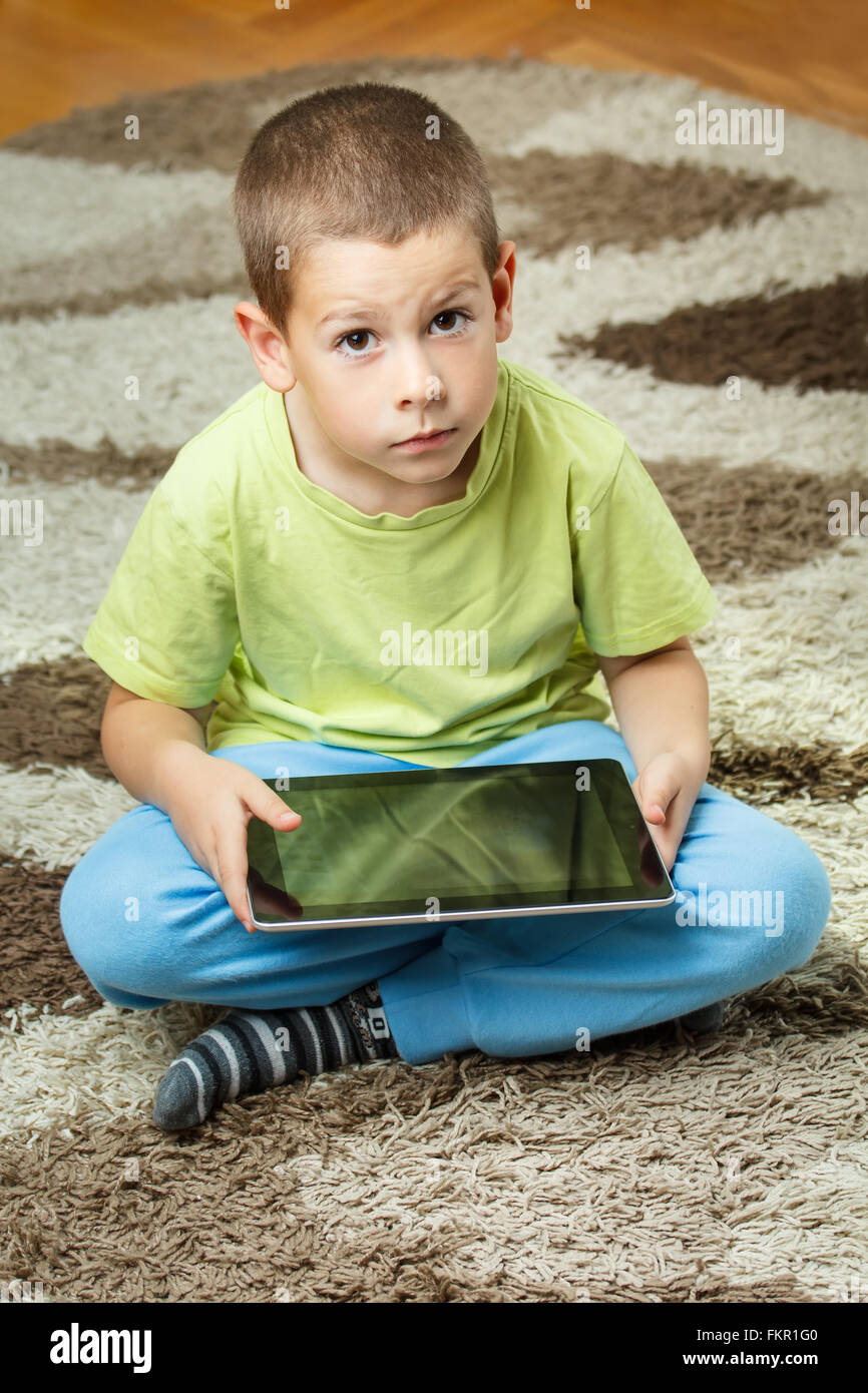 Sitting on floor carpet hi-res stock photography and images - Alamy