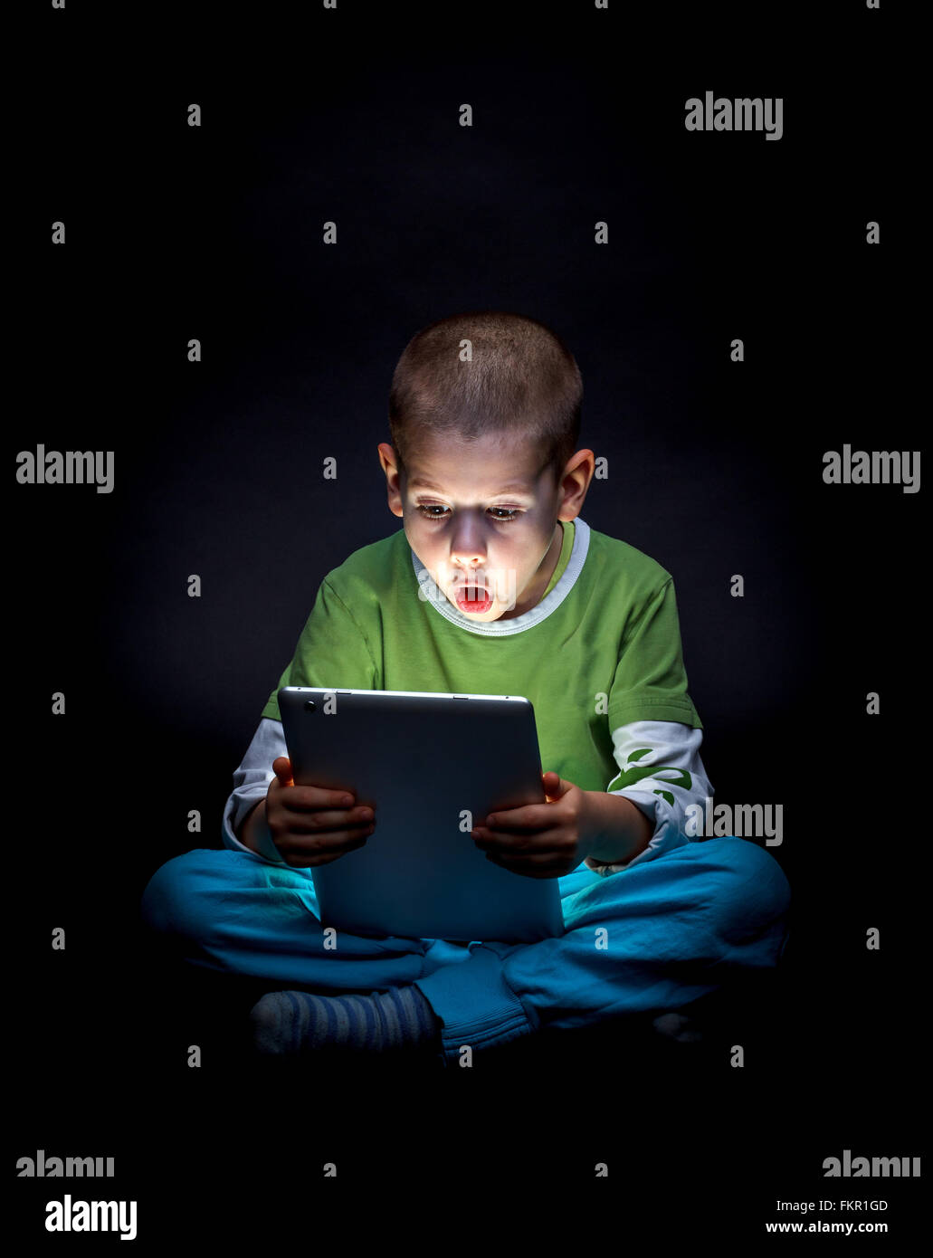 Black child and computer and surprised hi-res stock photography and ...