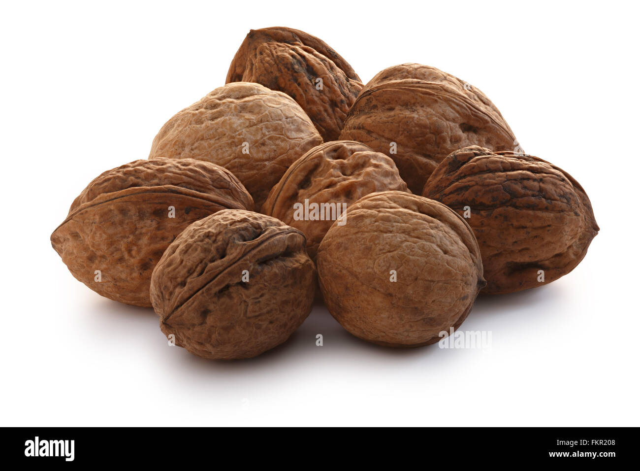 Heap of shelled whole walnuts (edible seeds of tree of Juglans regia ...