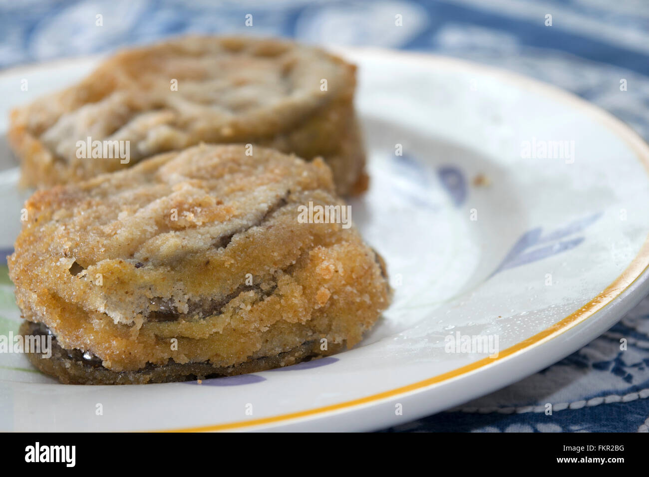 stuffed and battered aubergines fried in pan Stock Photo - Alamy