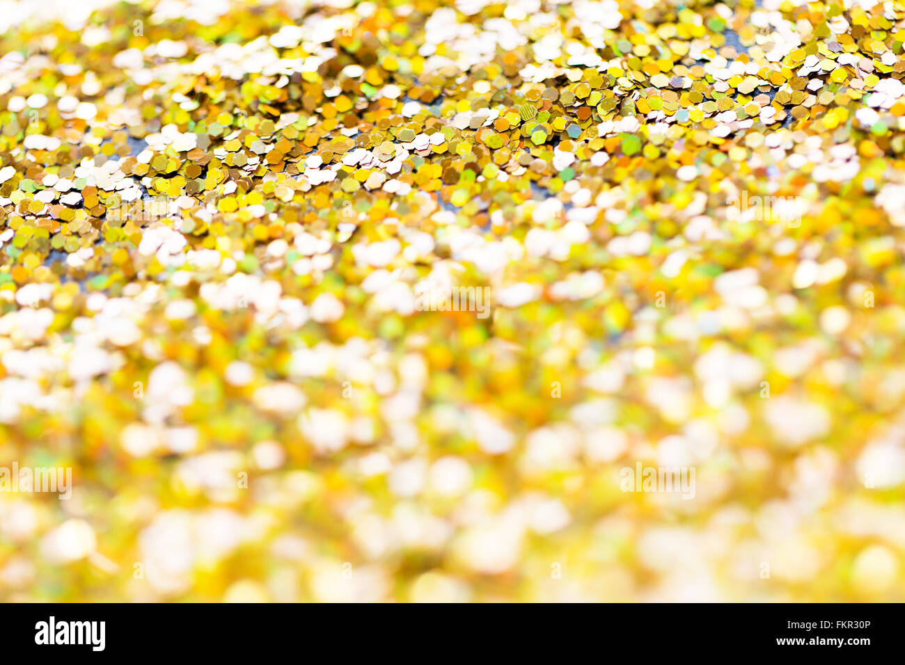 golden glitter or yellow sequins background Stock Photo - Alamy