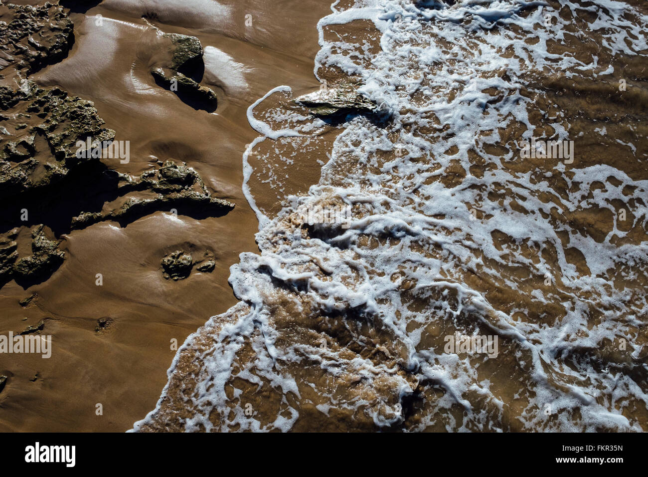 High angle view of waves on beach Stock Photo - Alamy