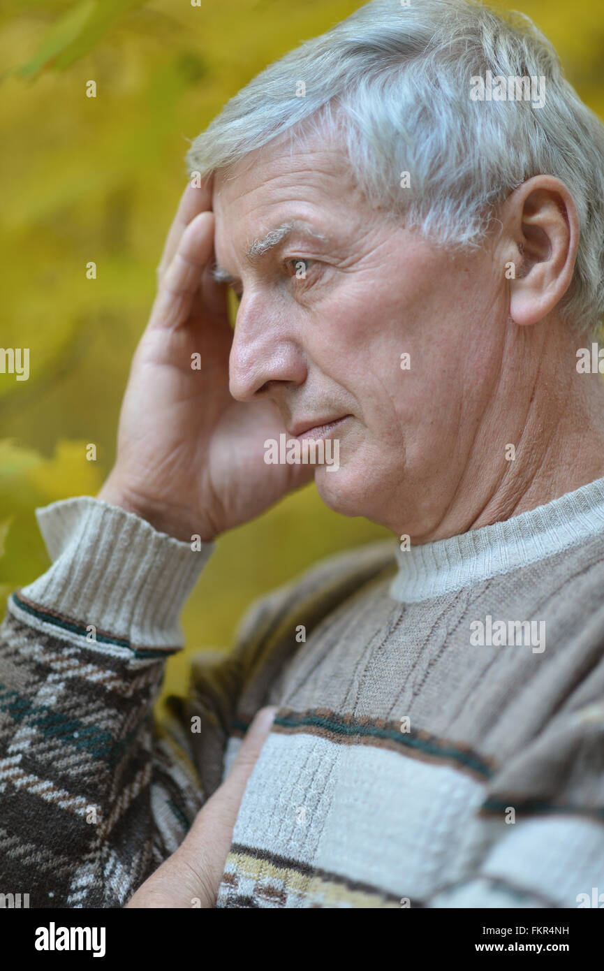 Senior man thinking Stock Photo - Alamy