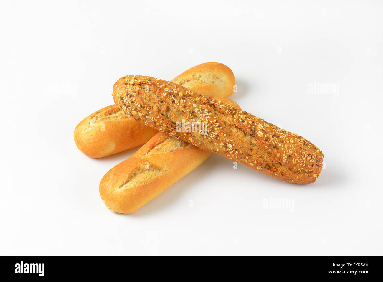 freshly baked bread rolls on white background Stock Photo - Alamy