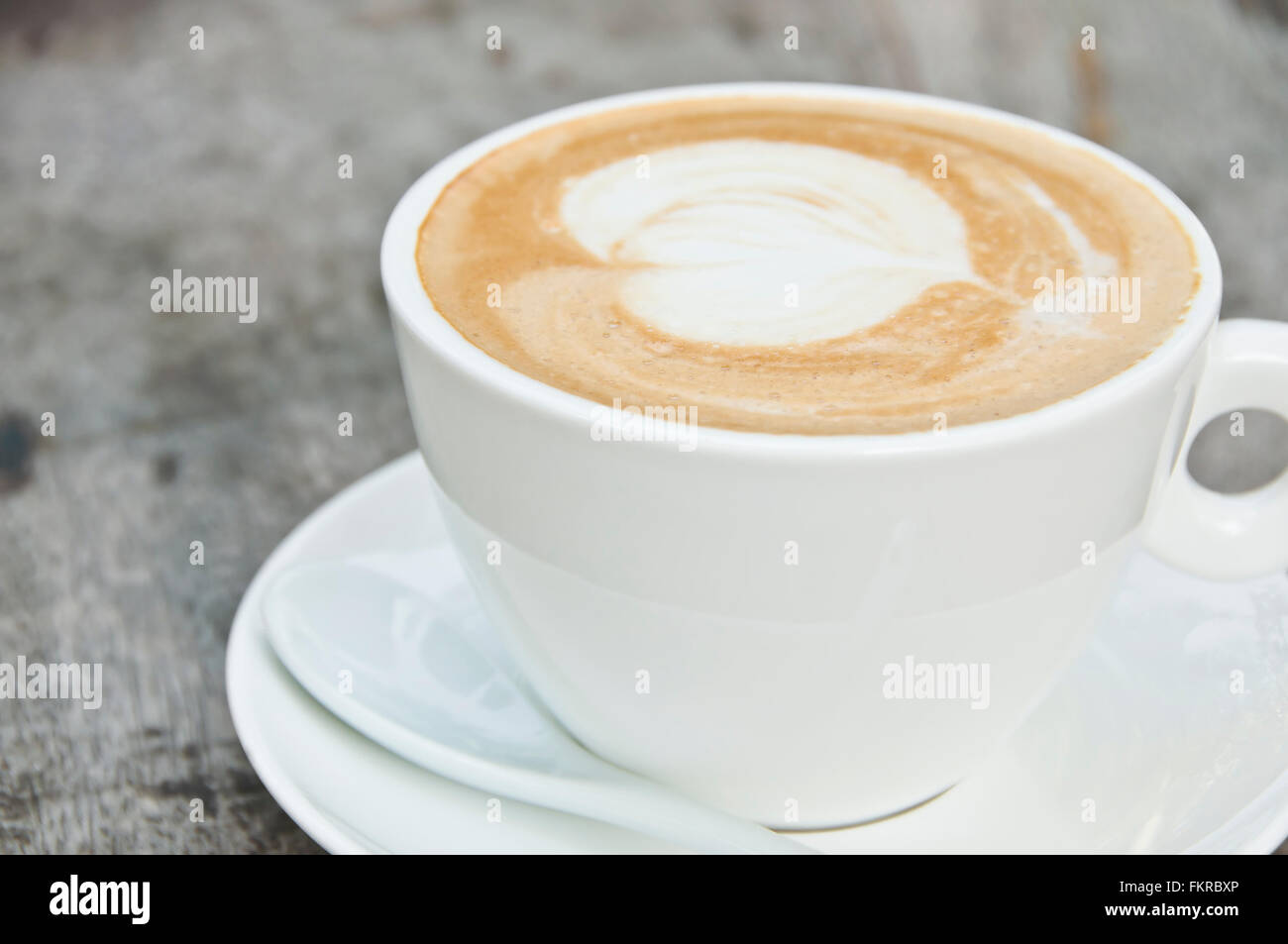 Hot cappuccino coffee in white cup Stock Photo - Alamy