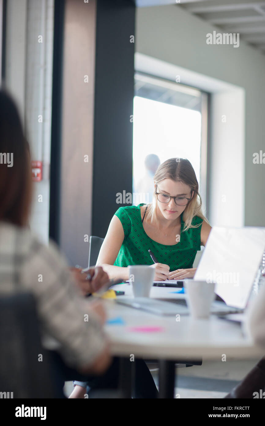 Young business associate working hi-res stock photography and images ...