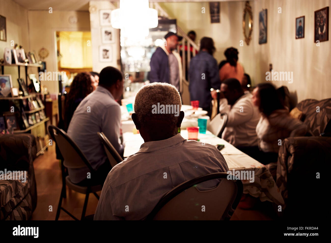 Sitting eating food and drink dining table hi-res stock photography and ...