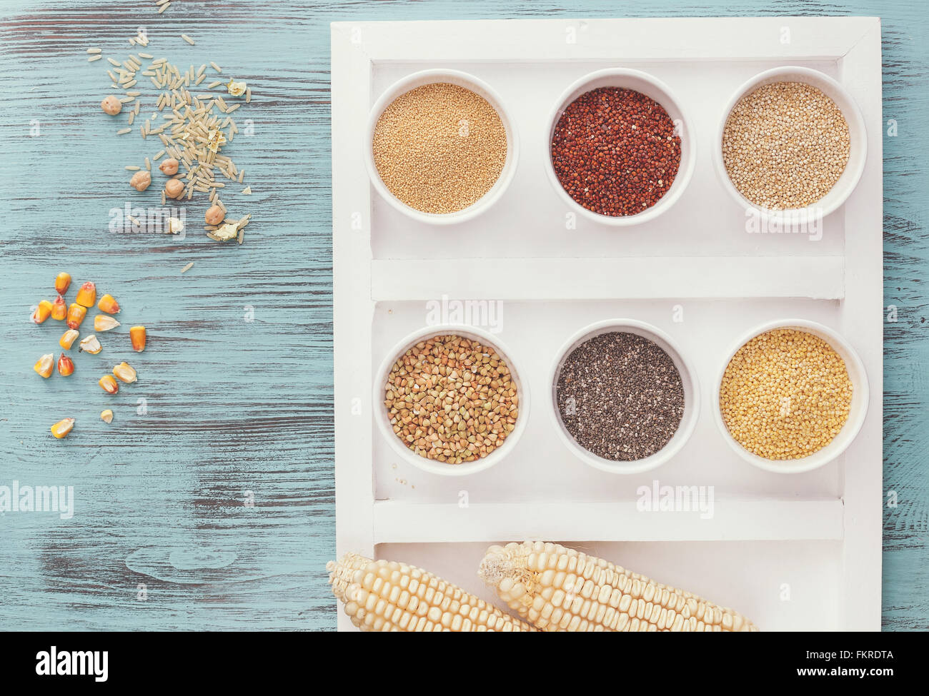 Various types of grains in bowls ( quinoa,amaranth, millet, chia ...