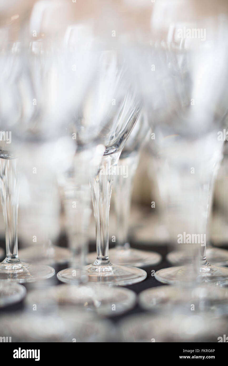 A row empty glasses at a party Stock Photo - Alamy