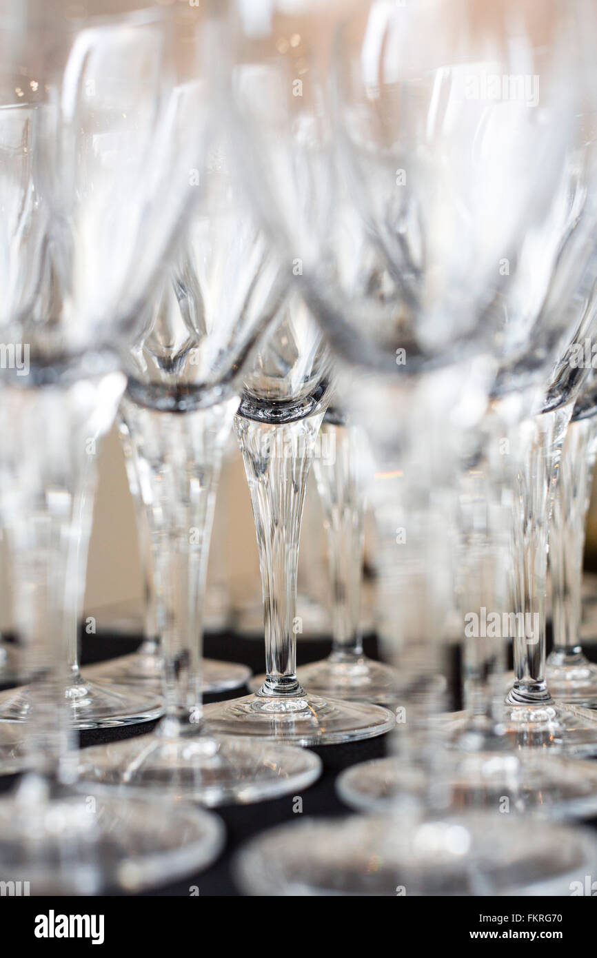 A row empty glasses at a party Stock Photo - Alamy