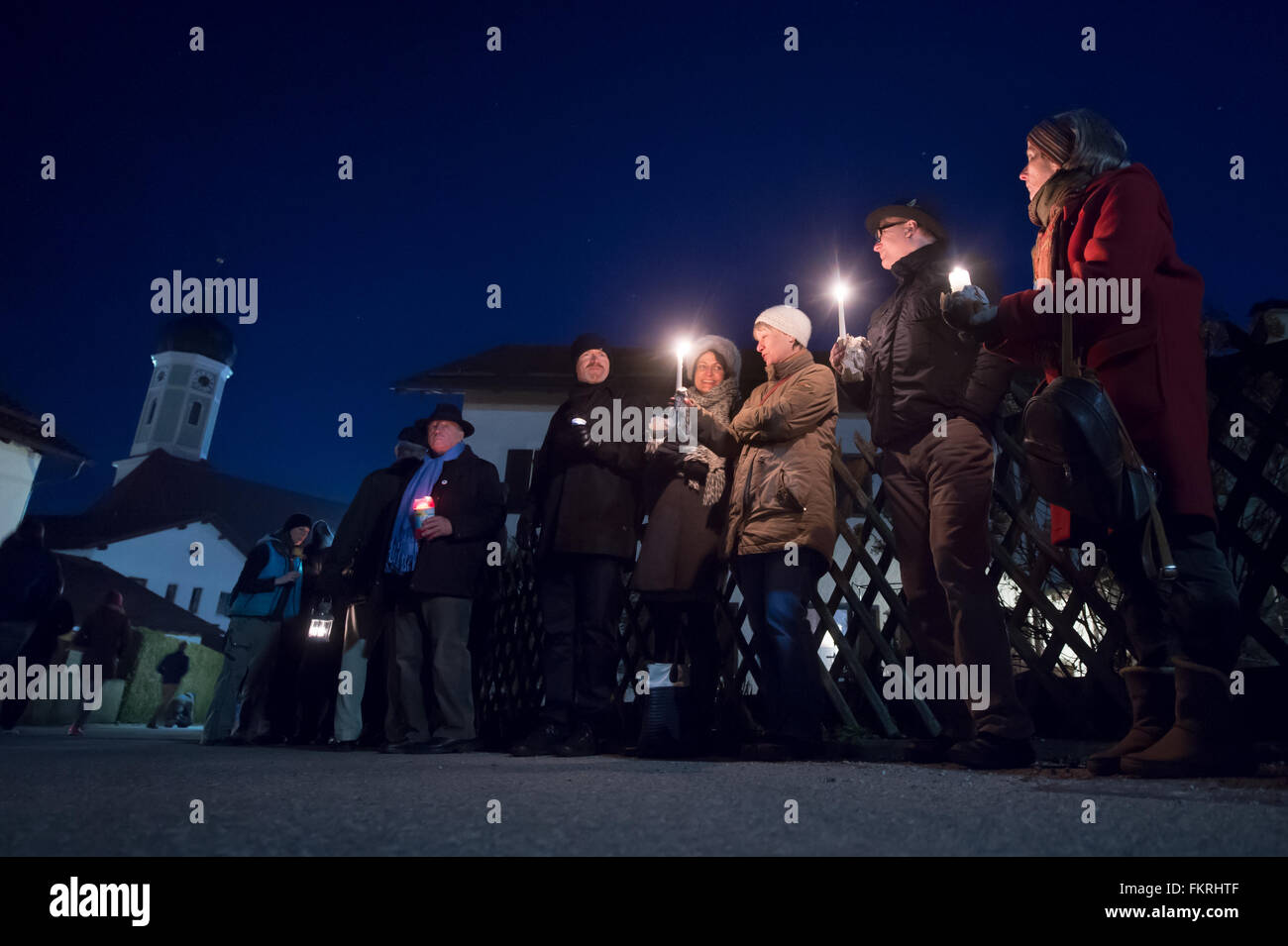 Zorneding, Germany. 09th Mar, 2016. People form a chain of lights along ...