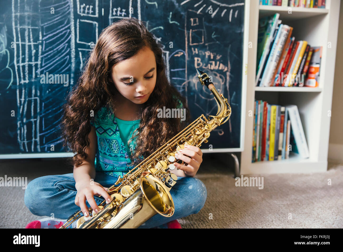 Children playing saxophone hi-res stock photography and images - Alamy