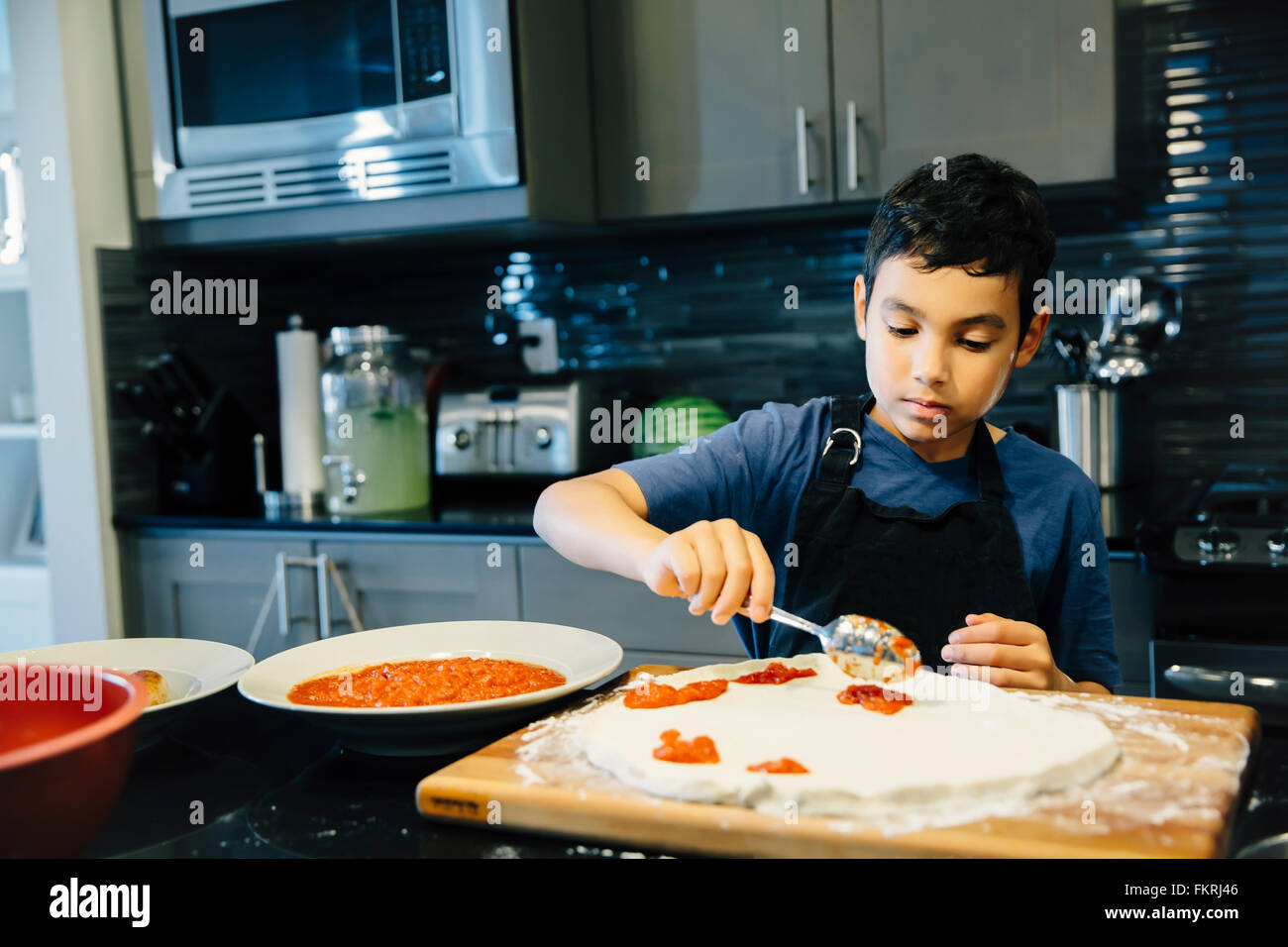 Pizza making and children hi-res stock photography and images - Alamy