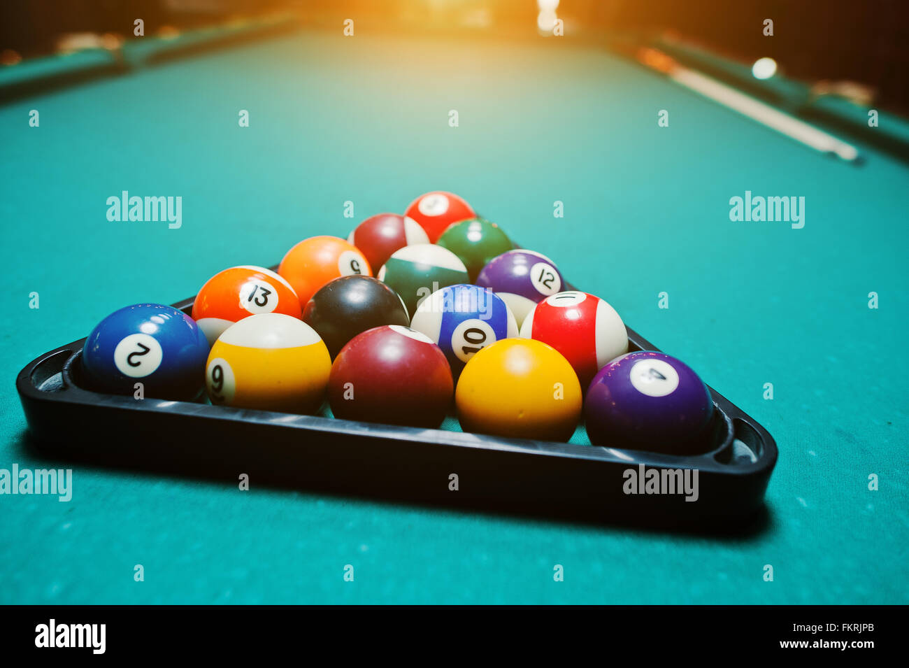 Billiard balls in a pool table at triangle Stock Photo - Alamy
