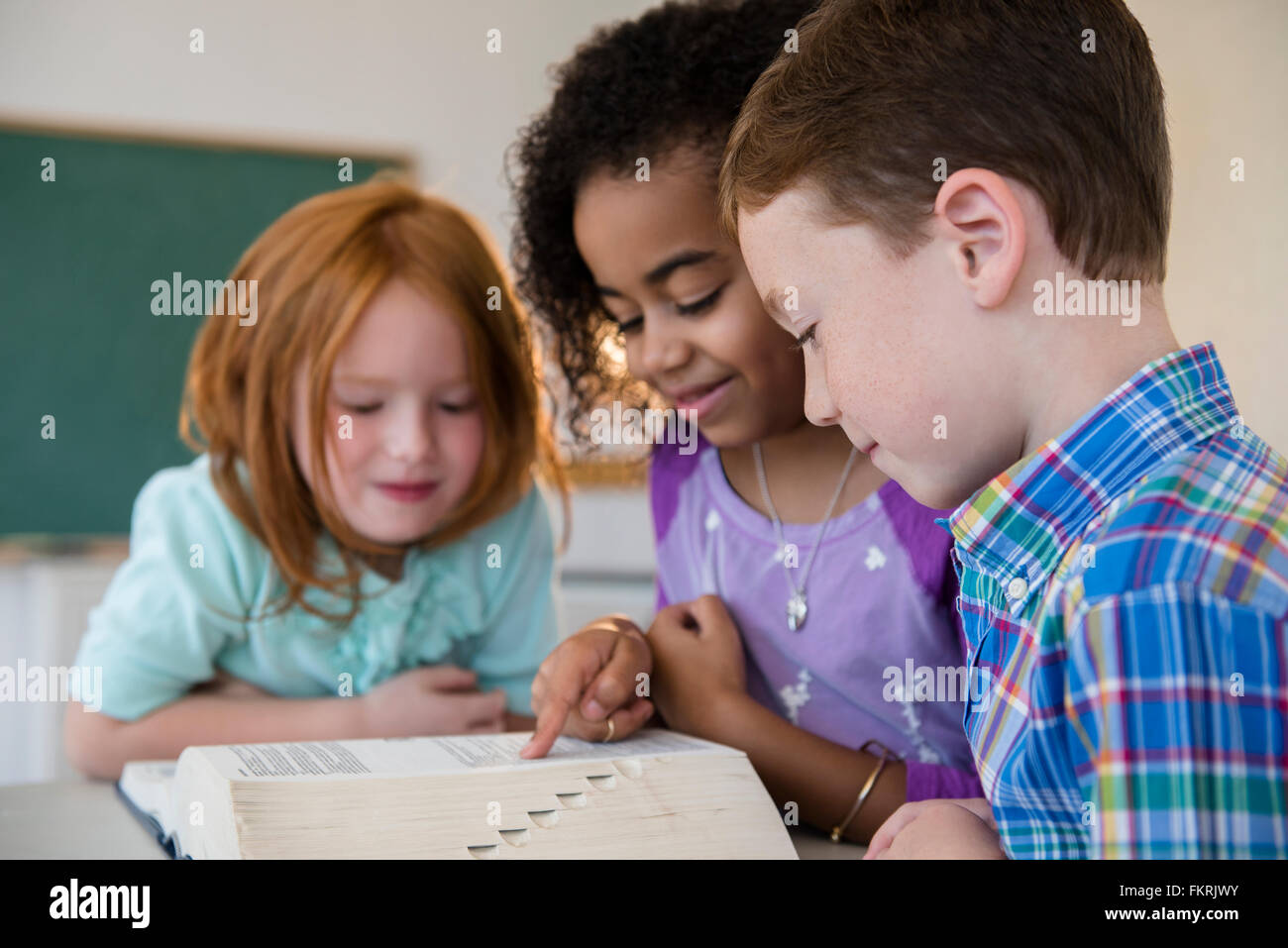 Child using dictionary hi-res stock photography and images - Alamy