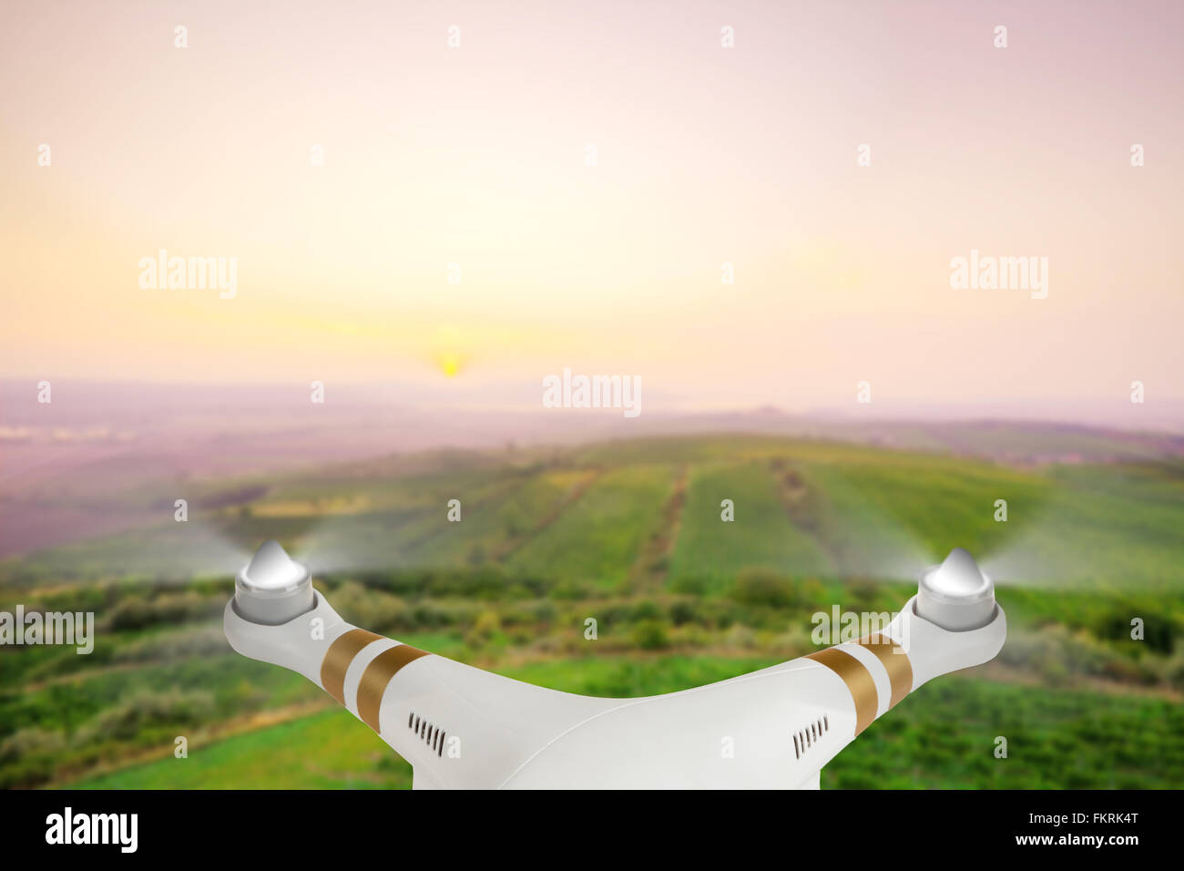 Drone flying above countryside Stock Photo - Alamy